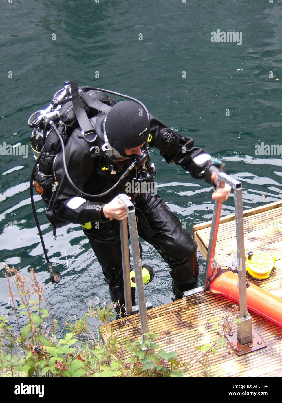Immersion suit entering water hi-res stock photography and images - Alamy