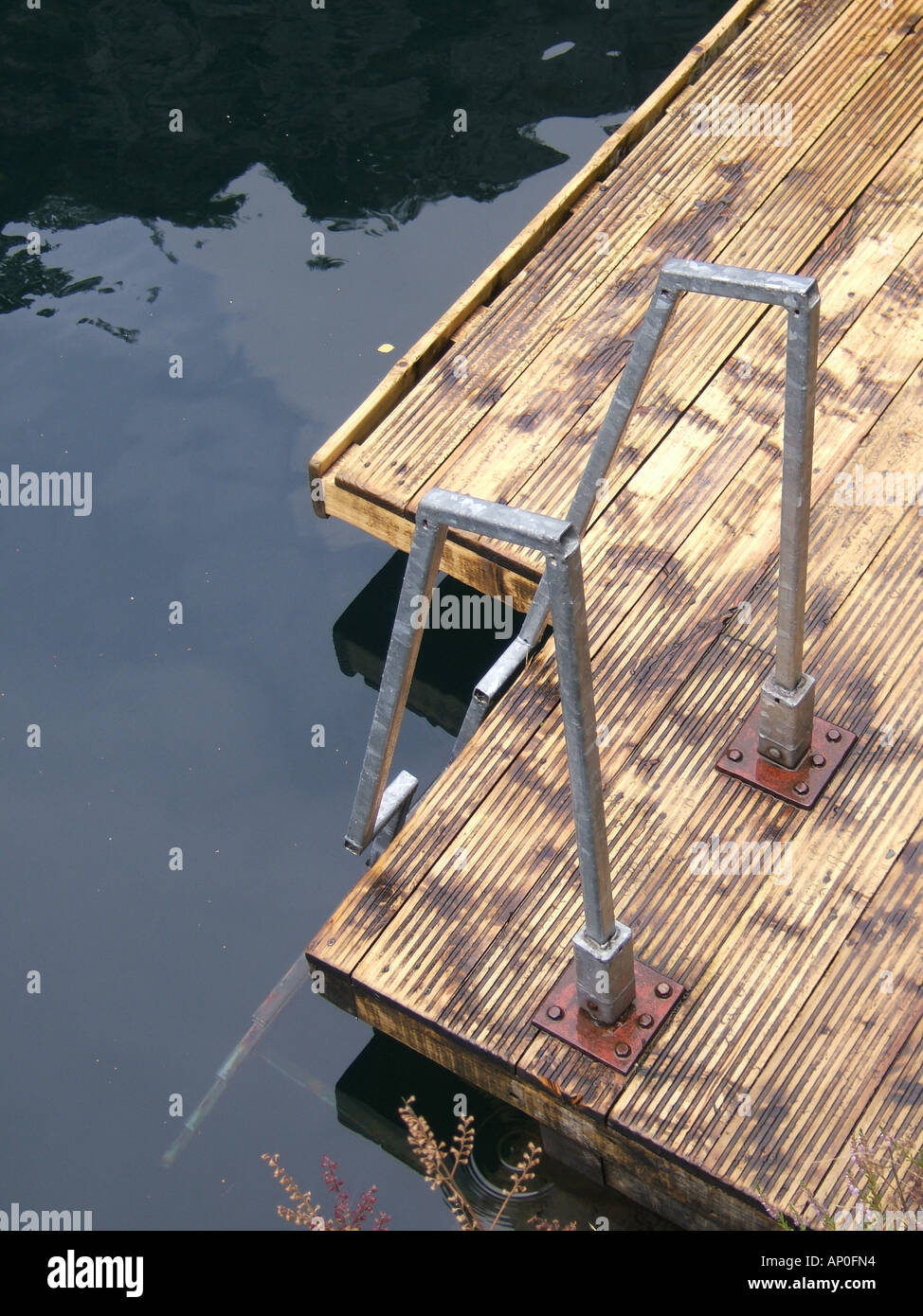 wooden diving platform by cold lake Stock Photo - Alamy