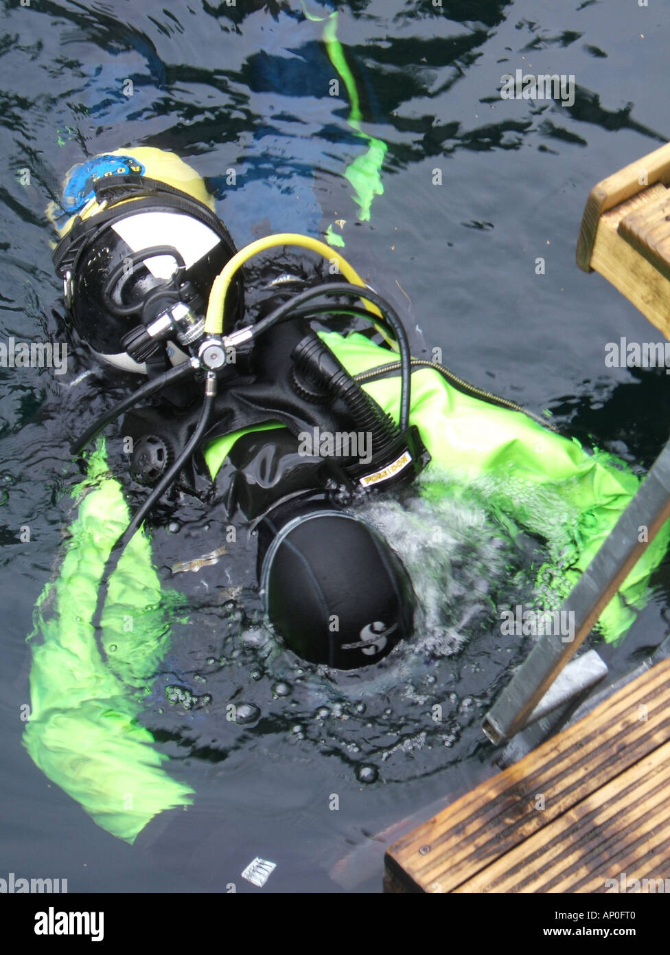 one diver in cold lake Stock Photo - Alamy