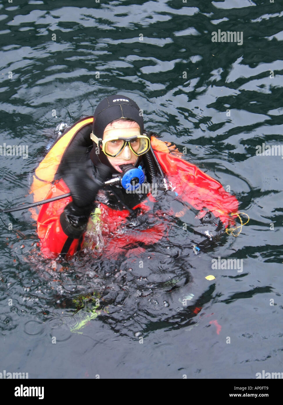 one diver in cold lake Stock Photo - Alamy