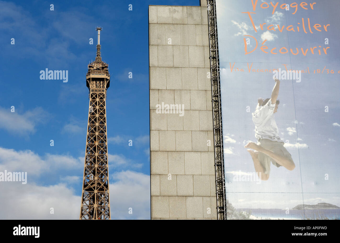 The Eiffel Tower with advertising hoarding appearing to jump to a great ...