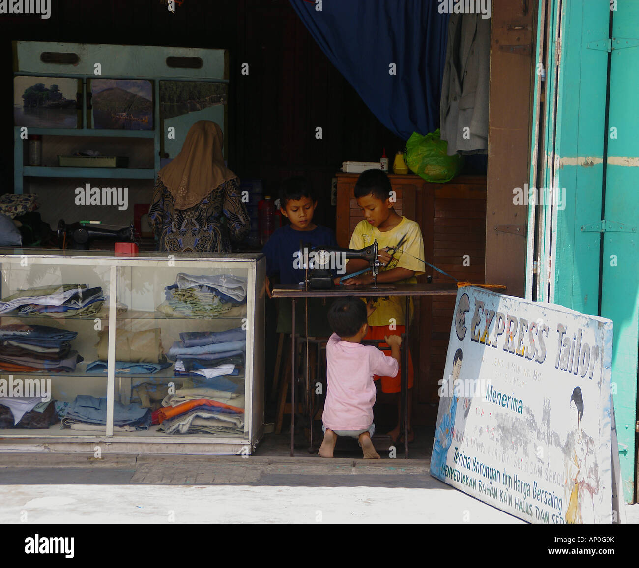 Tailor in asia hi-res stock photography and images - Alamy