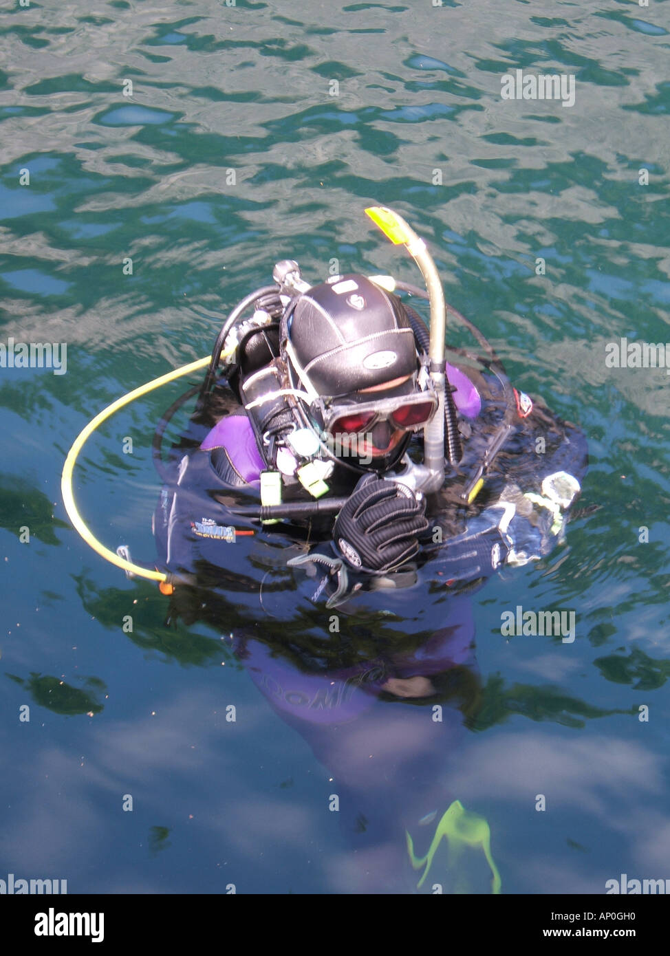 one diver in cold lake Stock Photo - Alamy