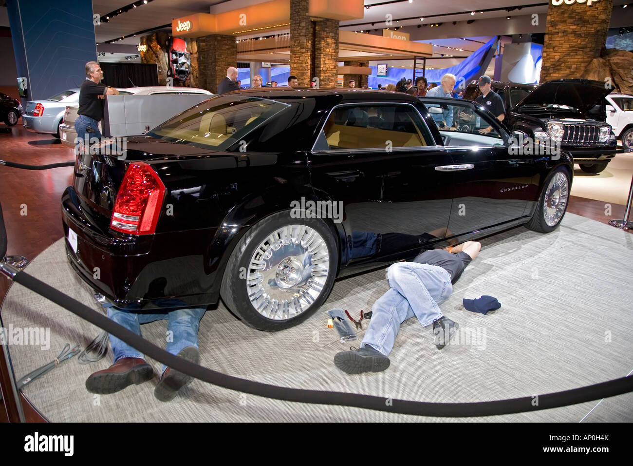 Detroit Michigan Workers setting up a car display at the North American ...