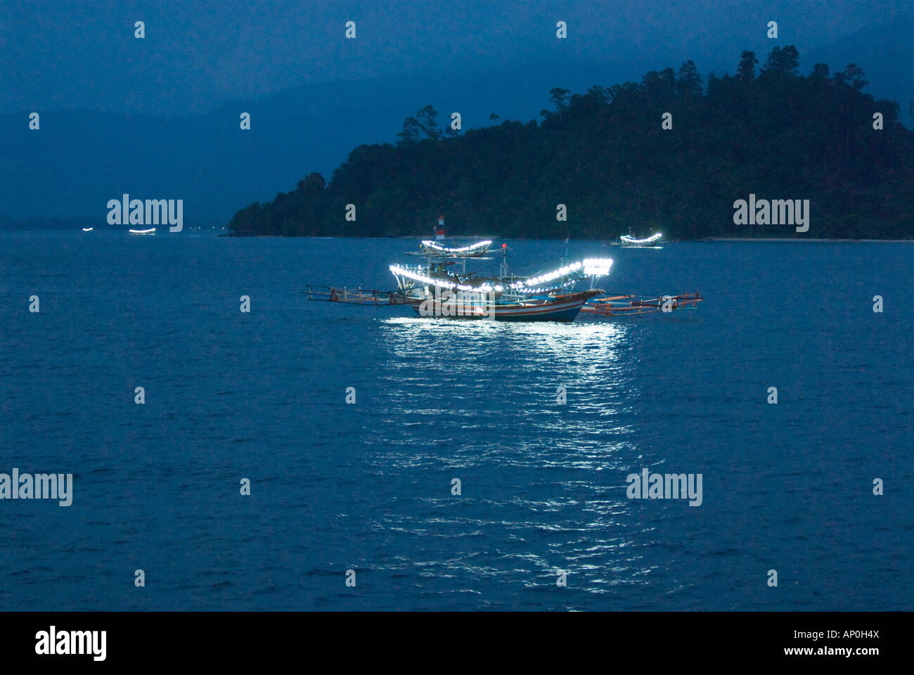 Fishing boats at night off Padang Sumatra Indonesia Stock Photo - Alamy