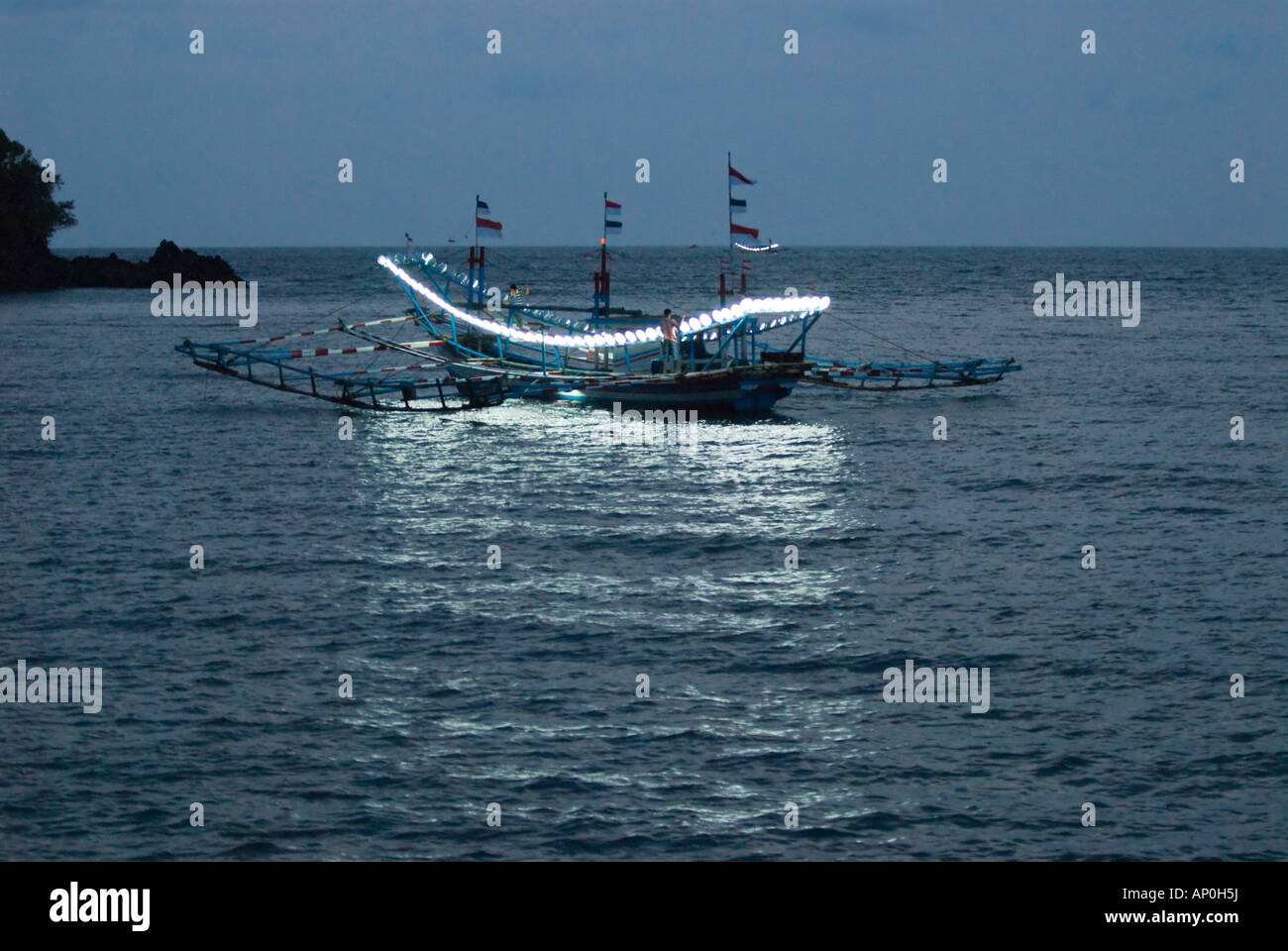 Fishing boats at night off Padang Sumatra Indonesia Stock Photo - Alamy