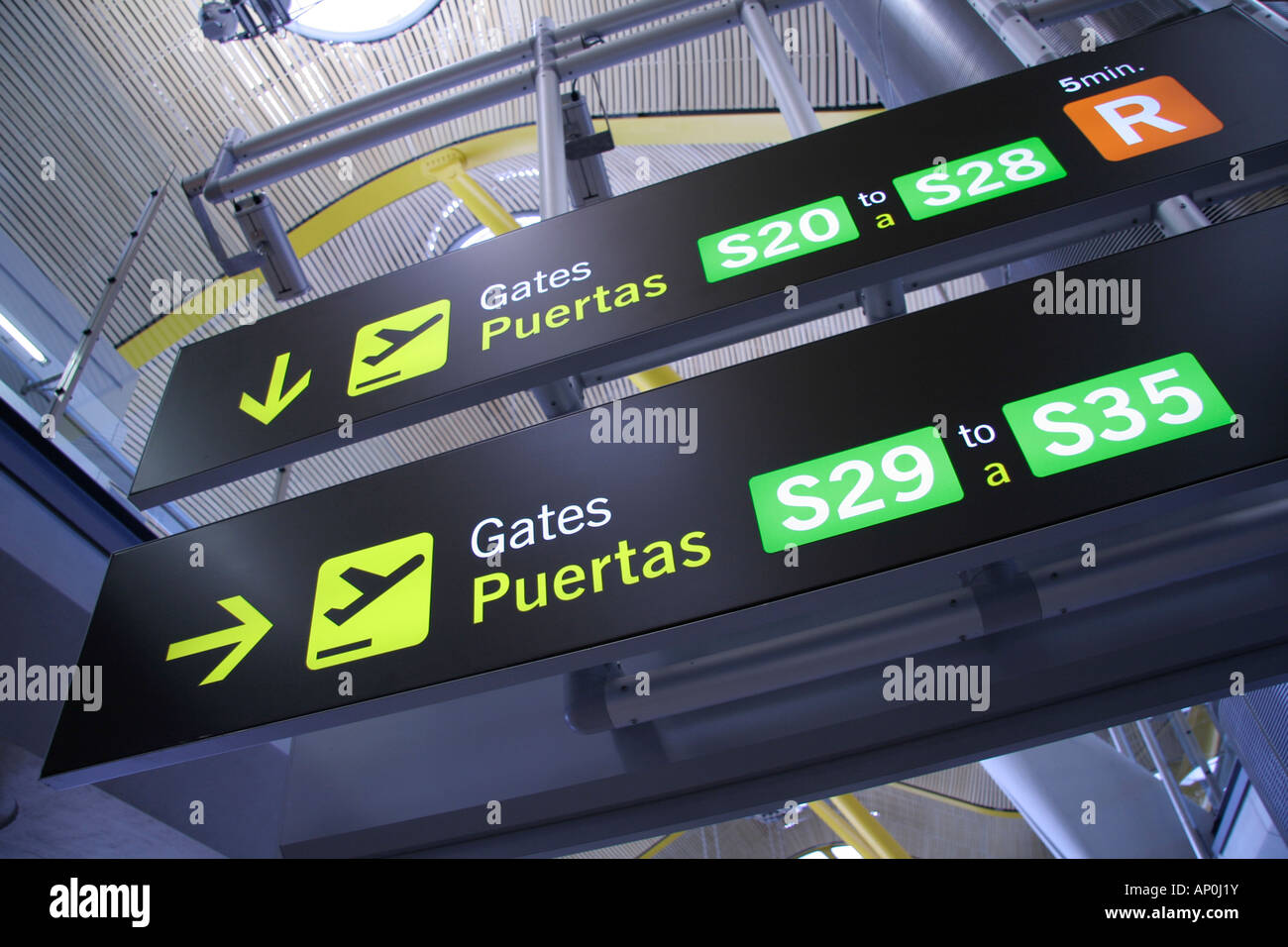 gate information panel in airport madrid spain Stock Photo - Alamy