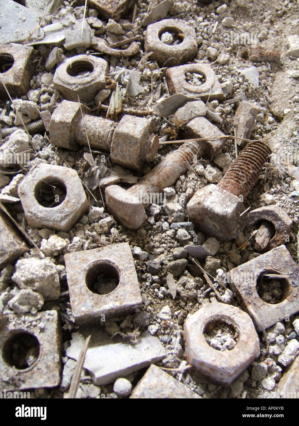old nuts and bolts on derelict factory floor Stock Photo - Alamy