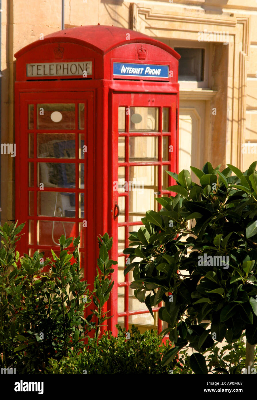 English traditional red phone box in Malta Stock Photo - Alamy