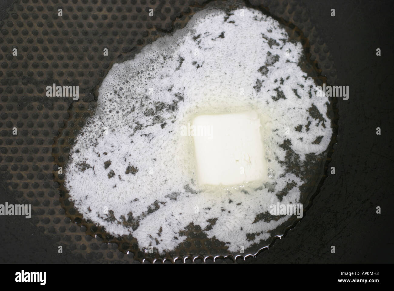 butter melting in a frying pan Stock Photo - Alamy