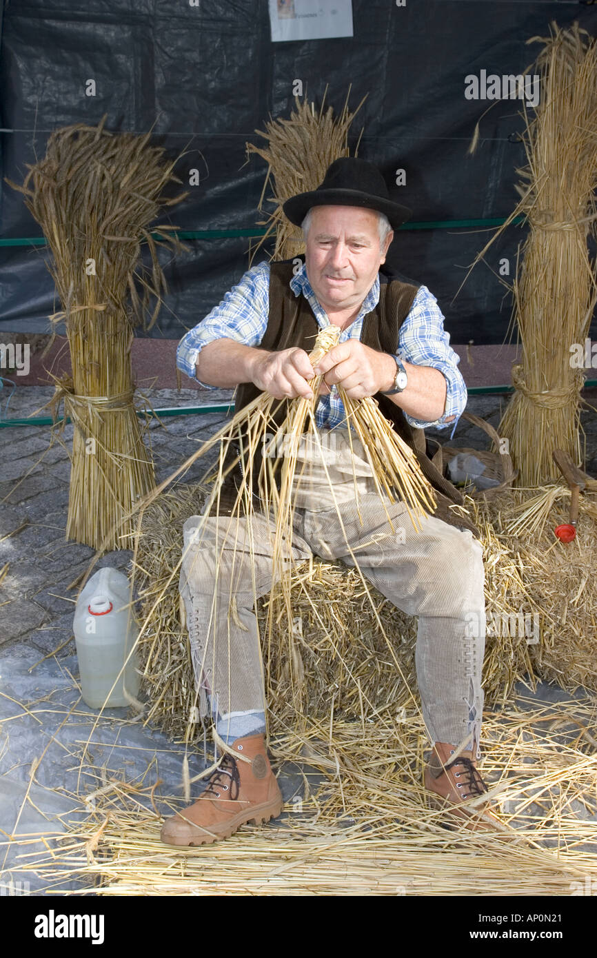 French craftsman smoking pipe making traditional straw boots jacks ...