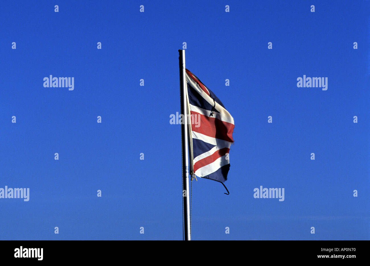 Ripped Union flag, Shingle Street, Suffolk, UK Stock Photo - Alamy