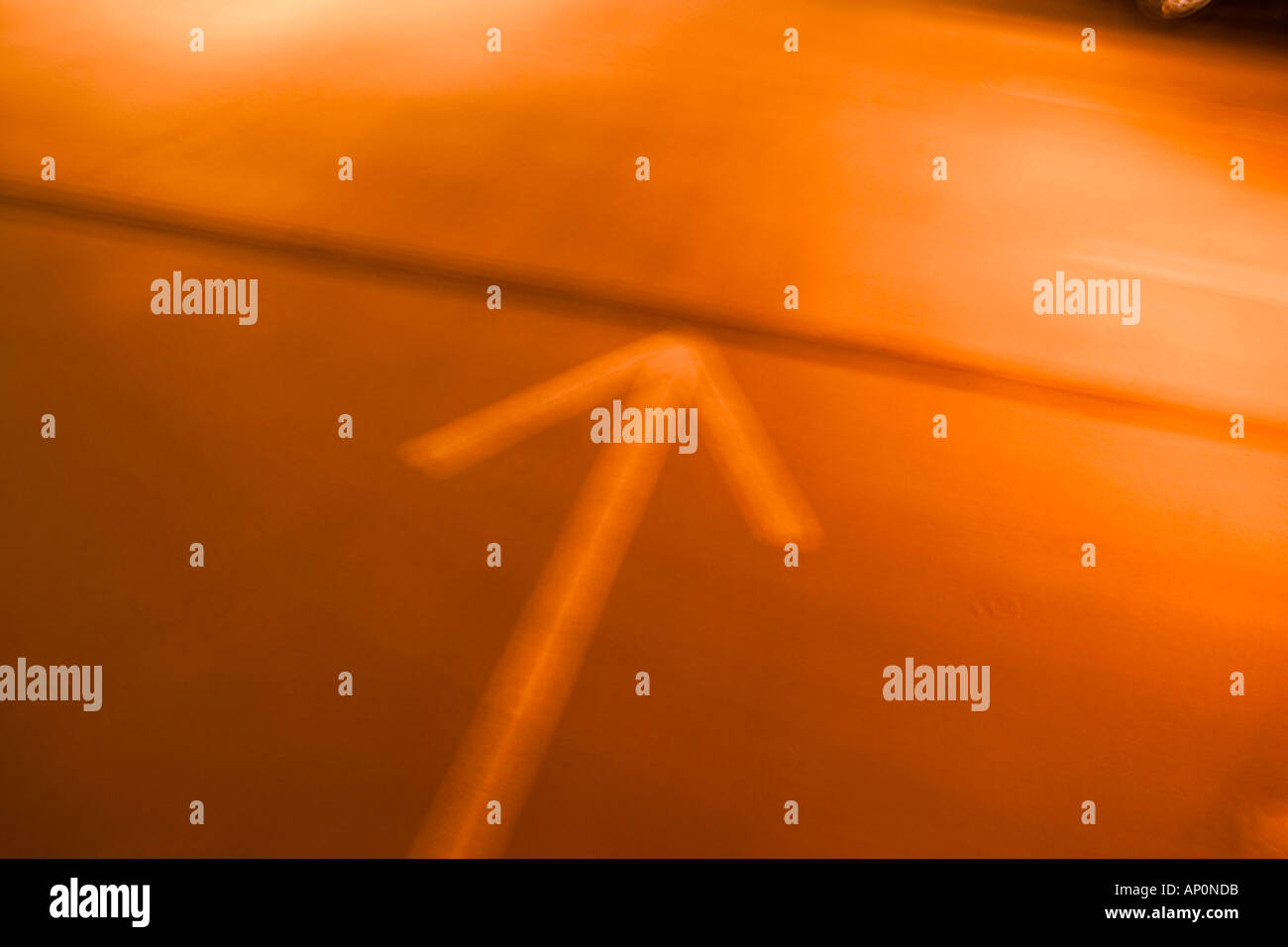 Traffic direction arrow painted on the floor of a parking garage Stock ...