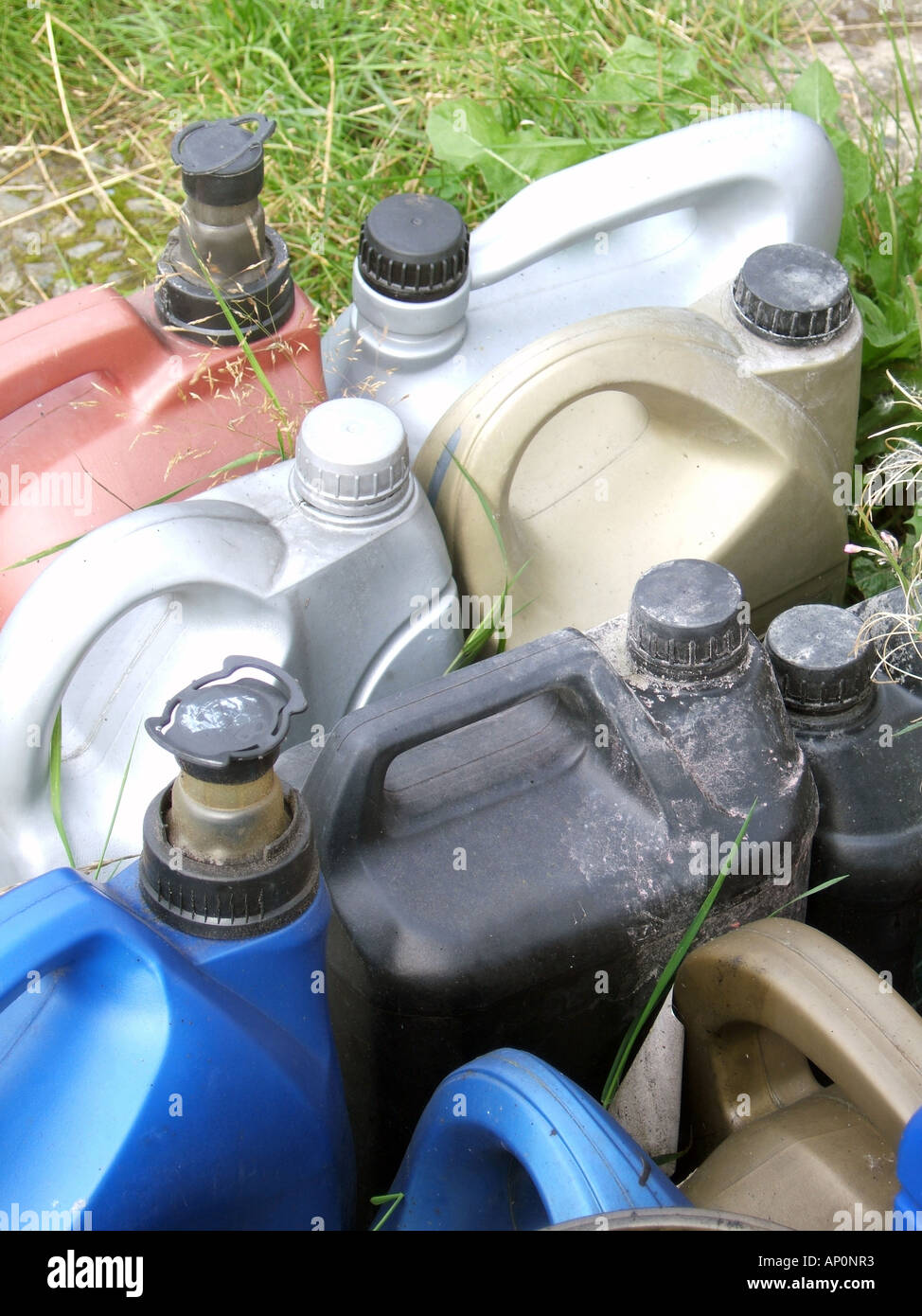 old oil plastic containers Stock Photo - Alamy