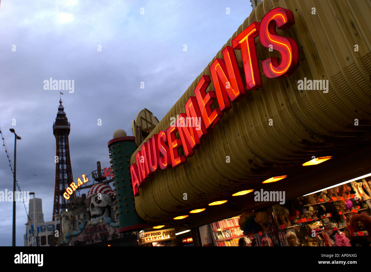 An amusements sign and Blackpool Tower in the coastal party town ...