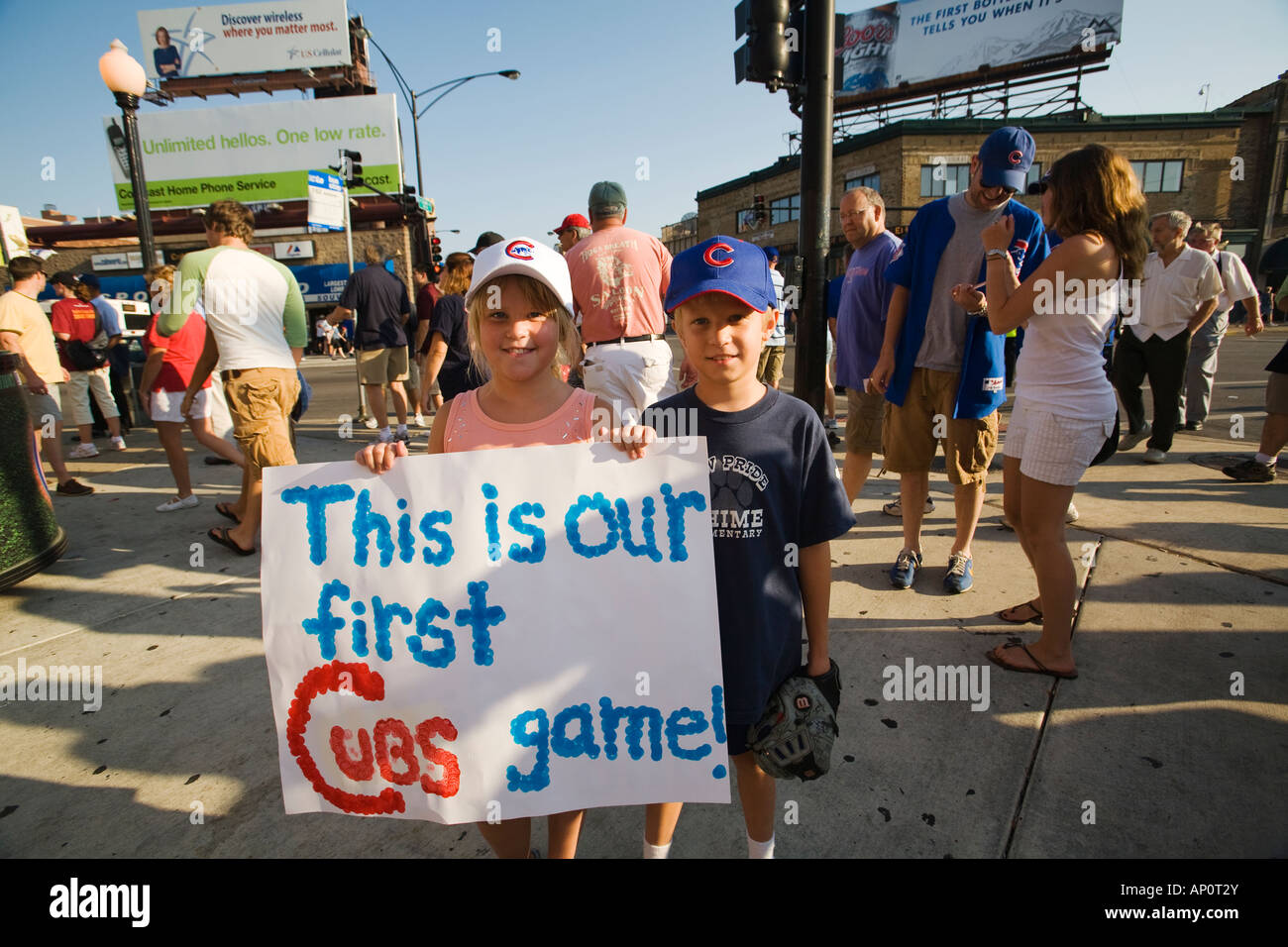 ILLINOIS Chicago Two children hold sign first Cubs game Wrigley Field ...