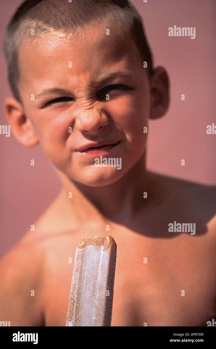 Boy with flavored ice Stock Photo - Alamy