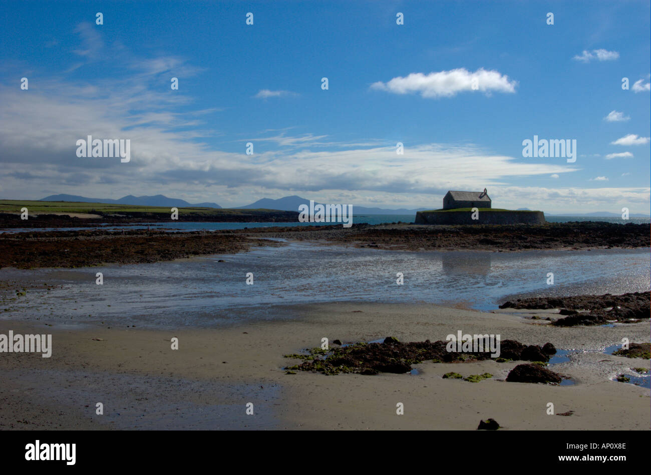 St Cwyfan s church near Aberffraw Anglesey North Wales with Yr Eifl or ...