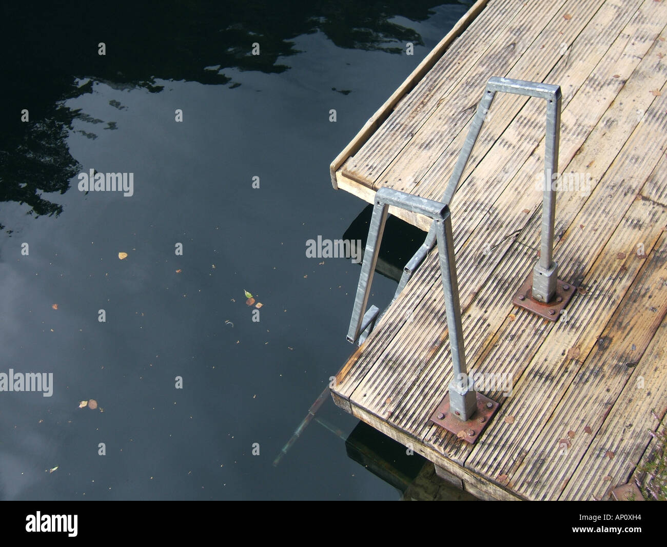 wooden diving platform by cold lake Stock Photo - Alamy