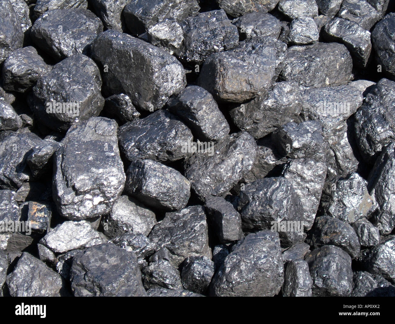 detail of coal pile and trees background and countryside Stock Photo ...