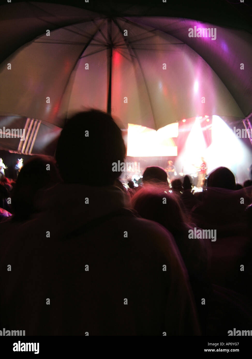 Umbrella wet rain crowd fan hi-res stock photography and images - Alamy