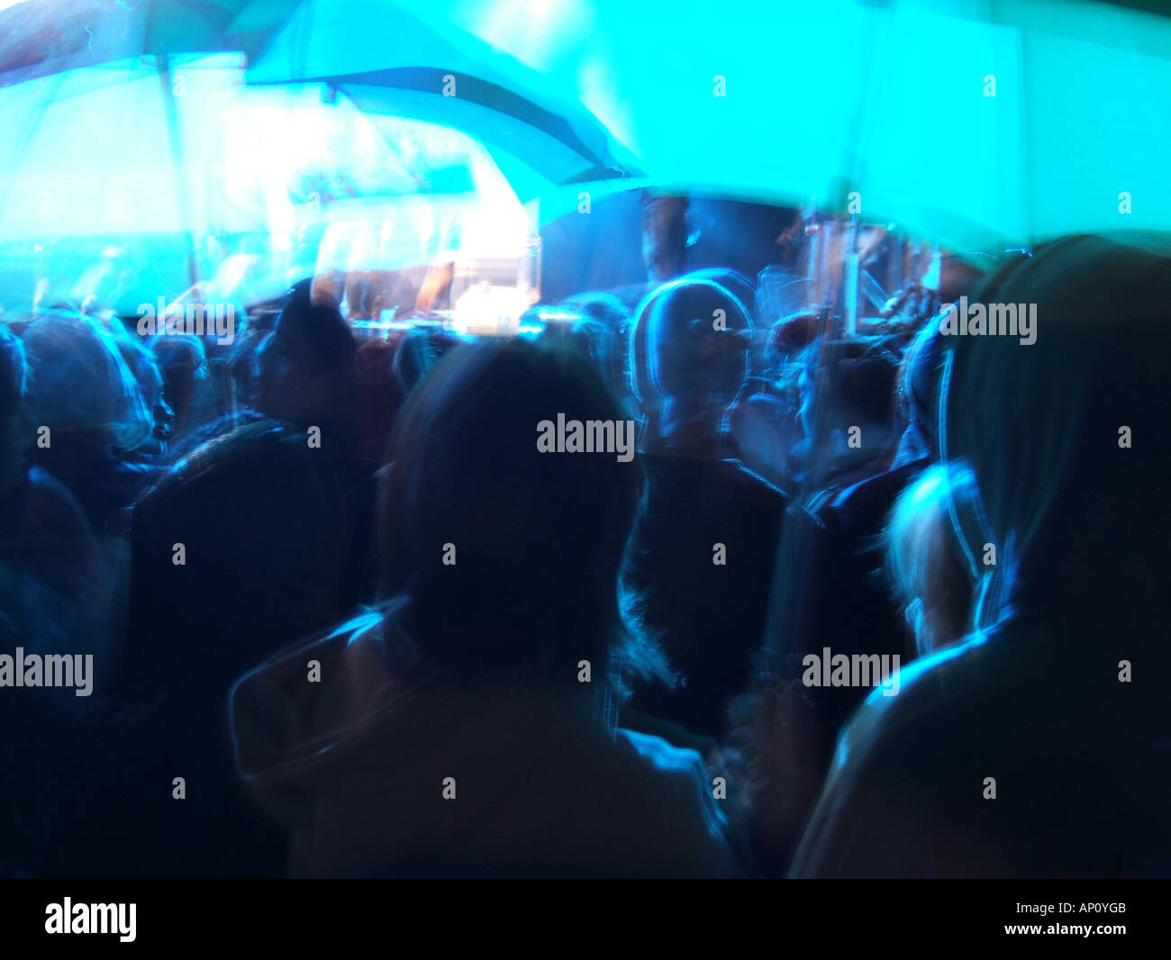 crowd in concert in pouring rain Stock Photo - Alamy