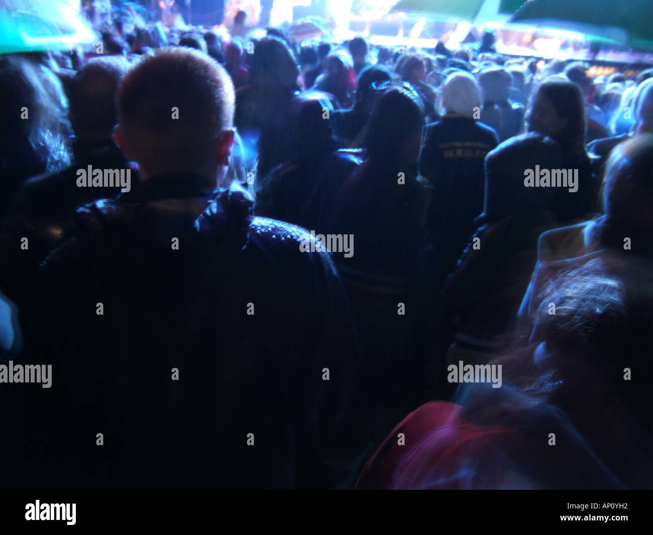 crowd in concert in pouring rain Stock Photo - Alamy
