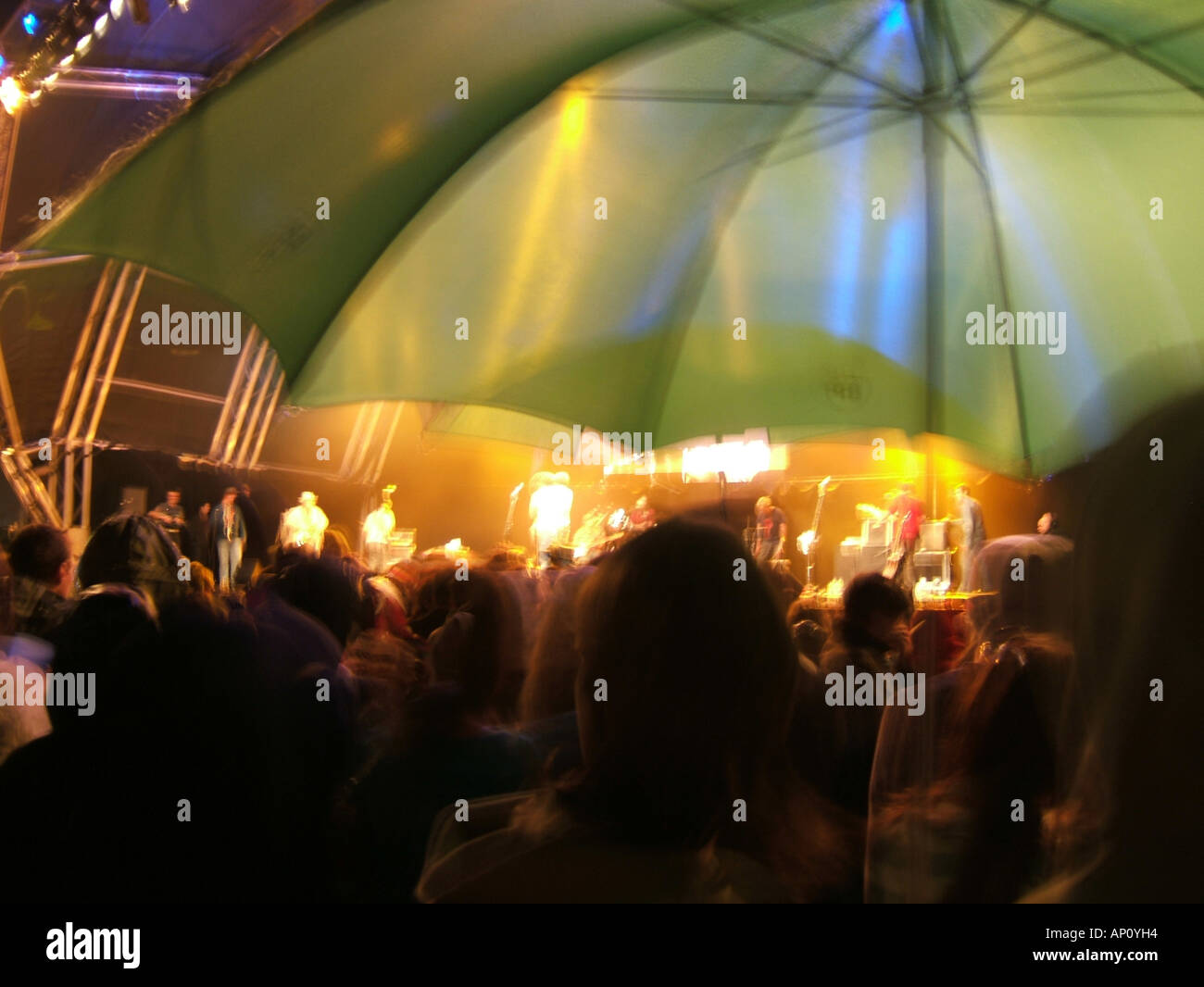 couple and crowd in concert in pouring rain Stock Photo - Alamy