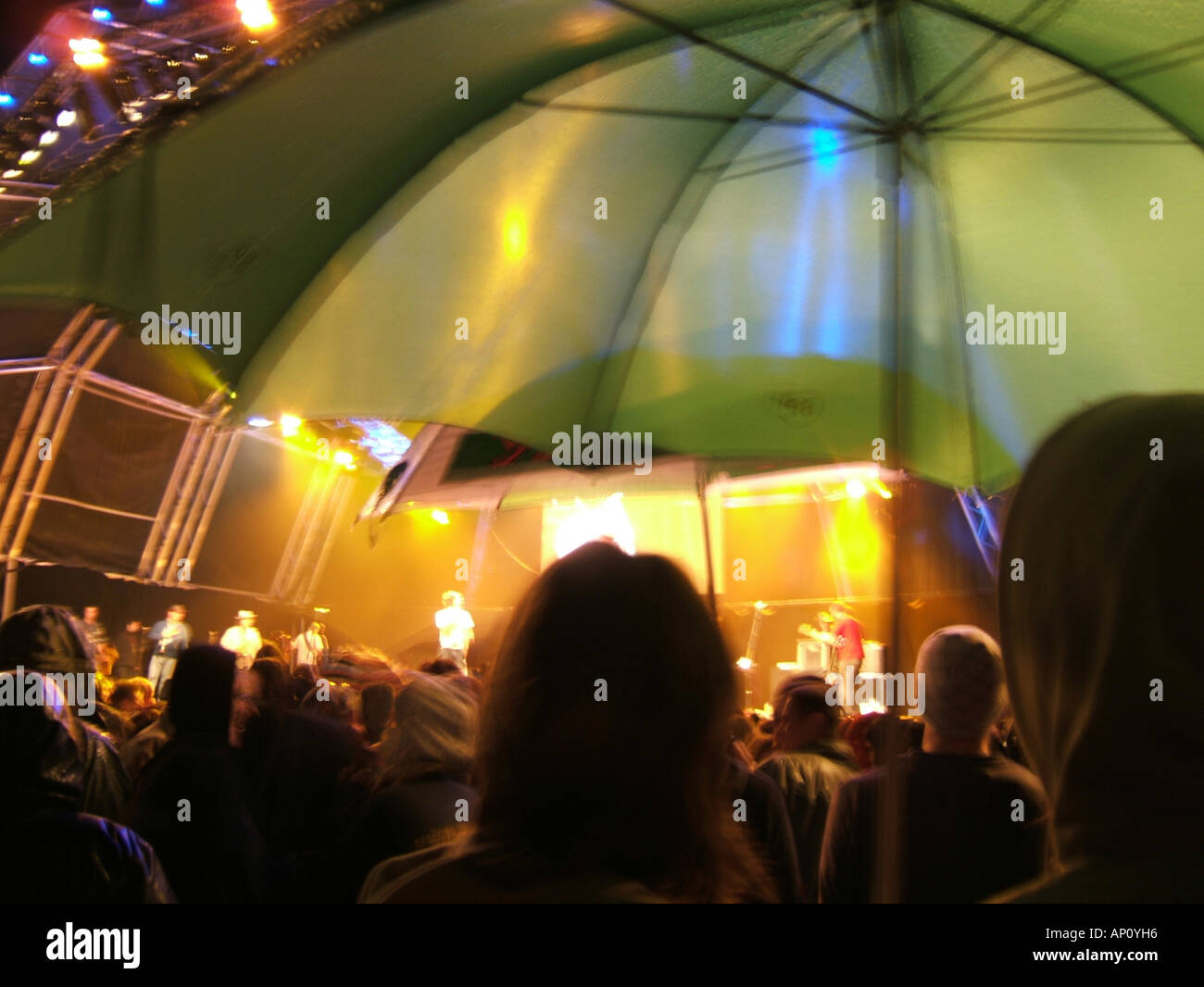 couple and crowd in concert in pouring rain Stock Photo - Alamy