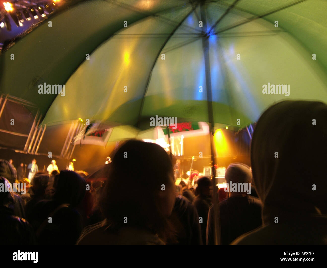 Umbrella wet rain crowd fan hi-res stock photography and images - Alamy