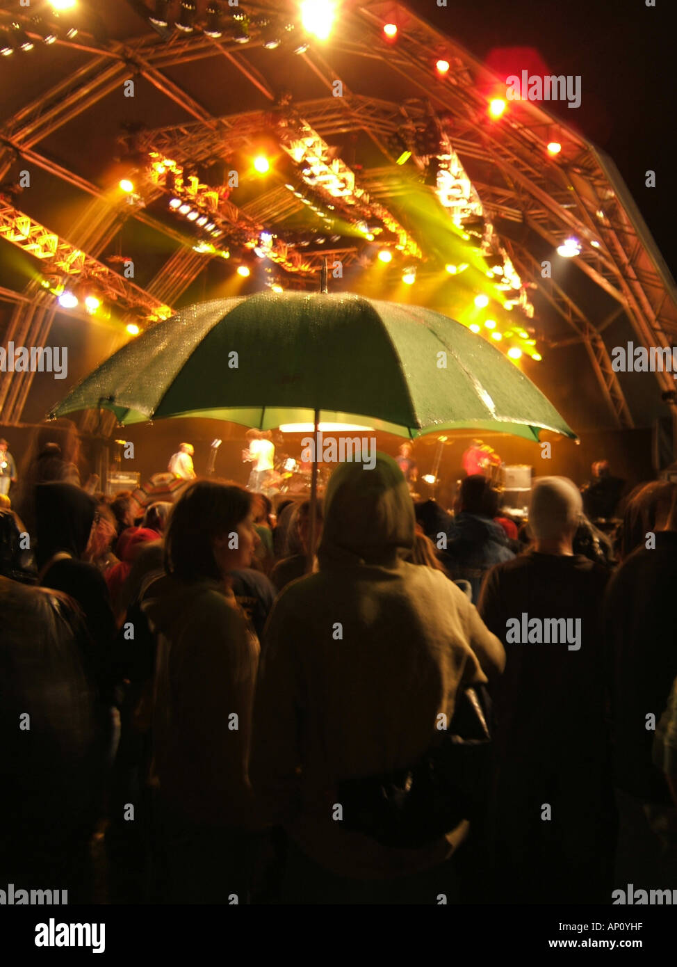 Umbrella wet rain crowd fan hi-res stock photography and images - Alamy