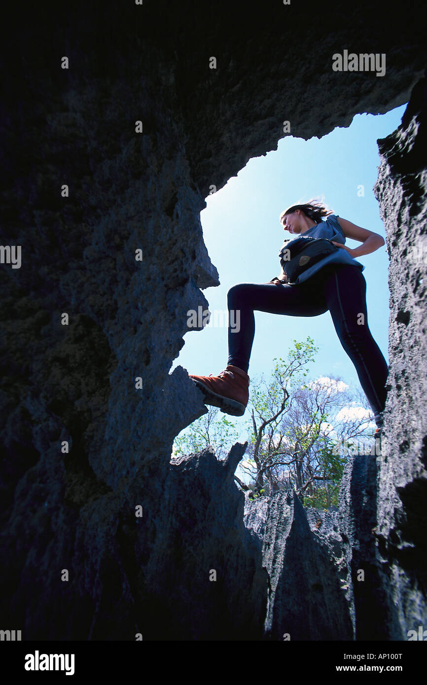 Woman hiking over rocks, Ankarana, Madagascar Stock Photo - Alamy