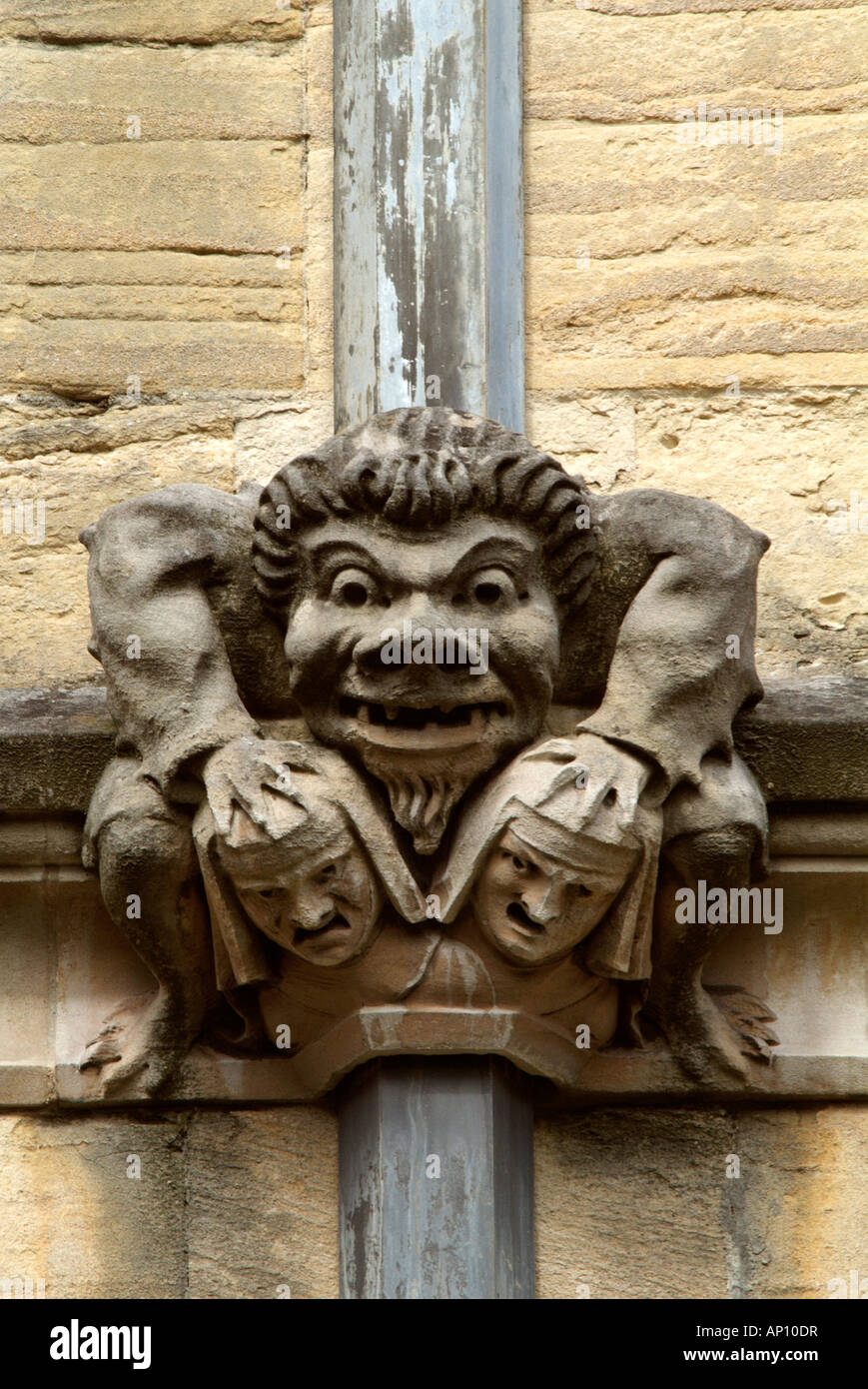 head gargoyle close up Oxford university town stone carving distorted ...