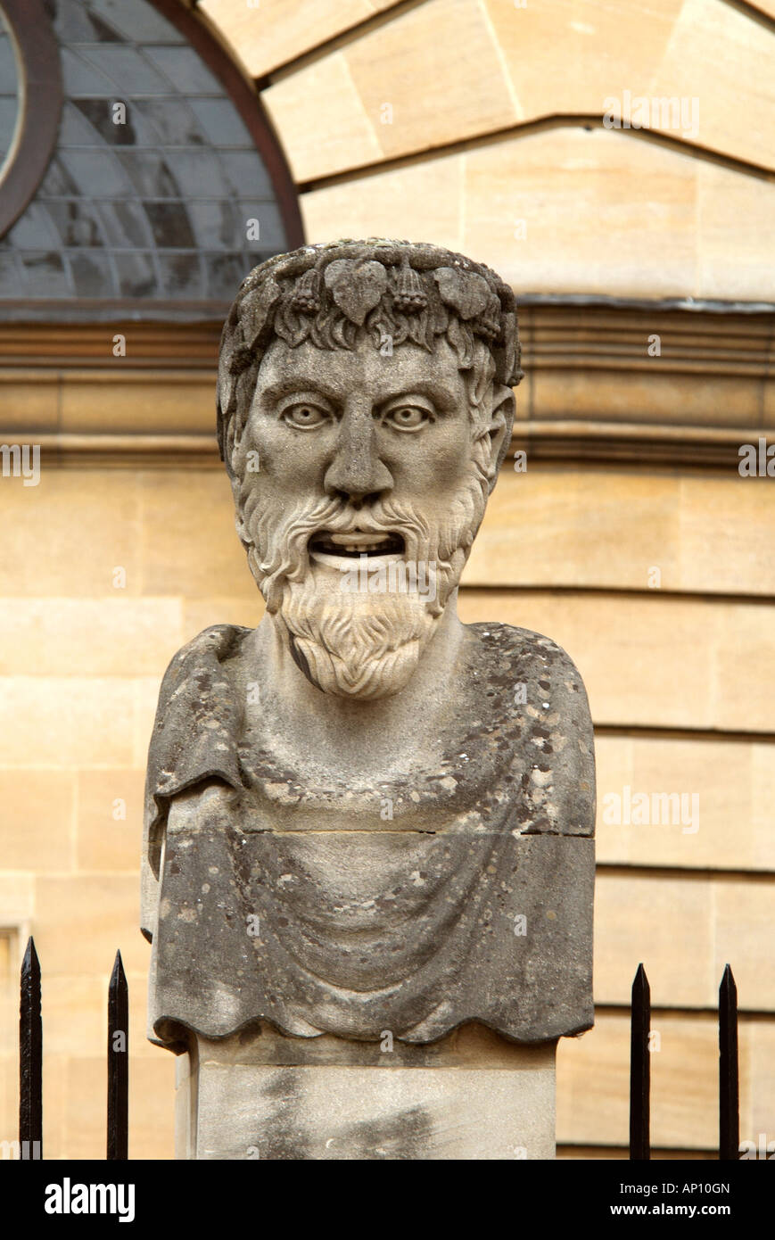 head gargoyle close up Oxford university town stone carving distorted ...