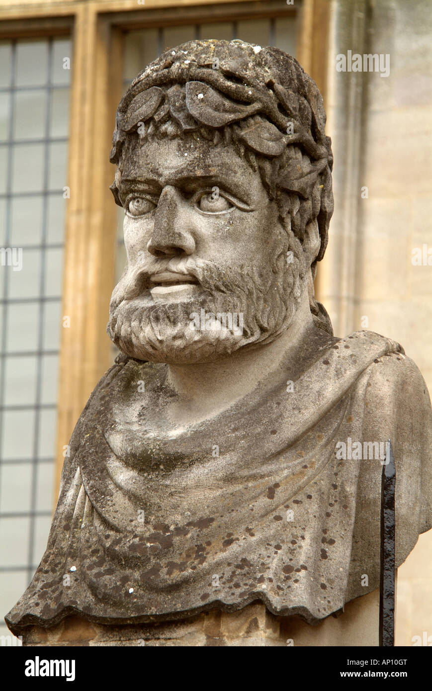 head gargoyle close up Oxford university town stone carving distorted ...