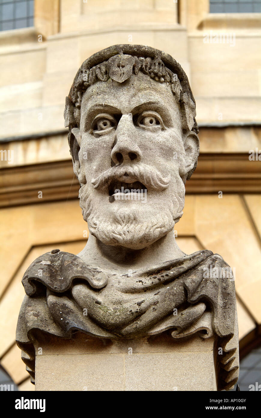 head gargoyle close up Oxford university town stone carving distorted ...