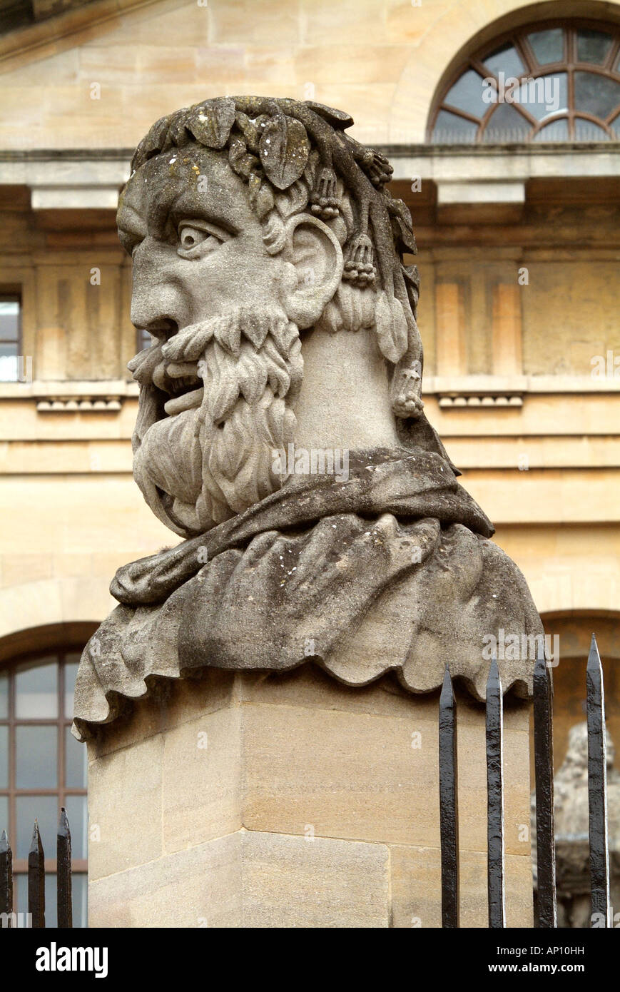 head gargoyle close up Oxford university town stone carving distorted ...