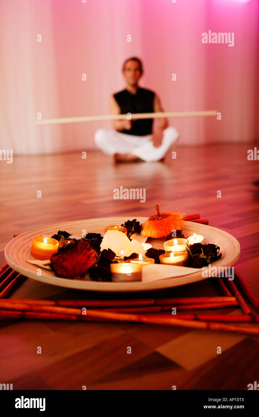 Man sitting cross legged balancing long hi-res stock photography and ...