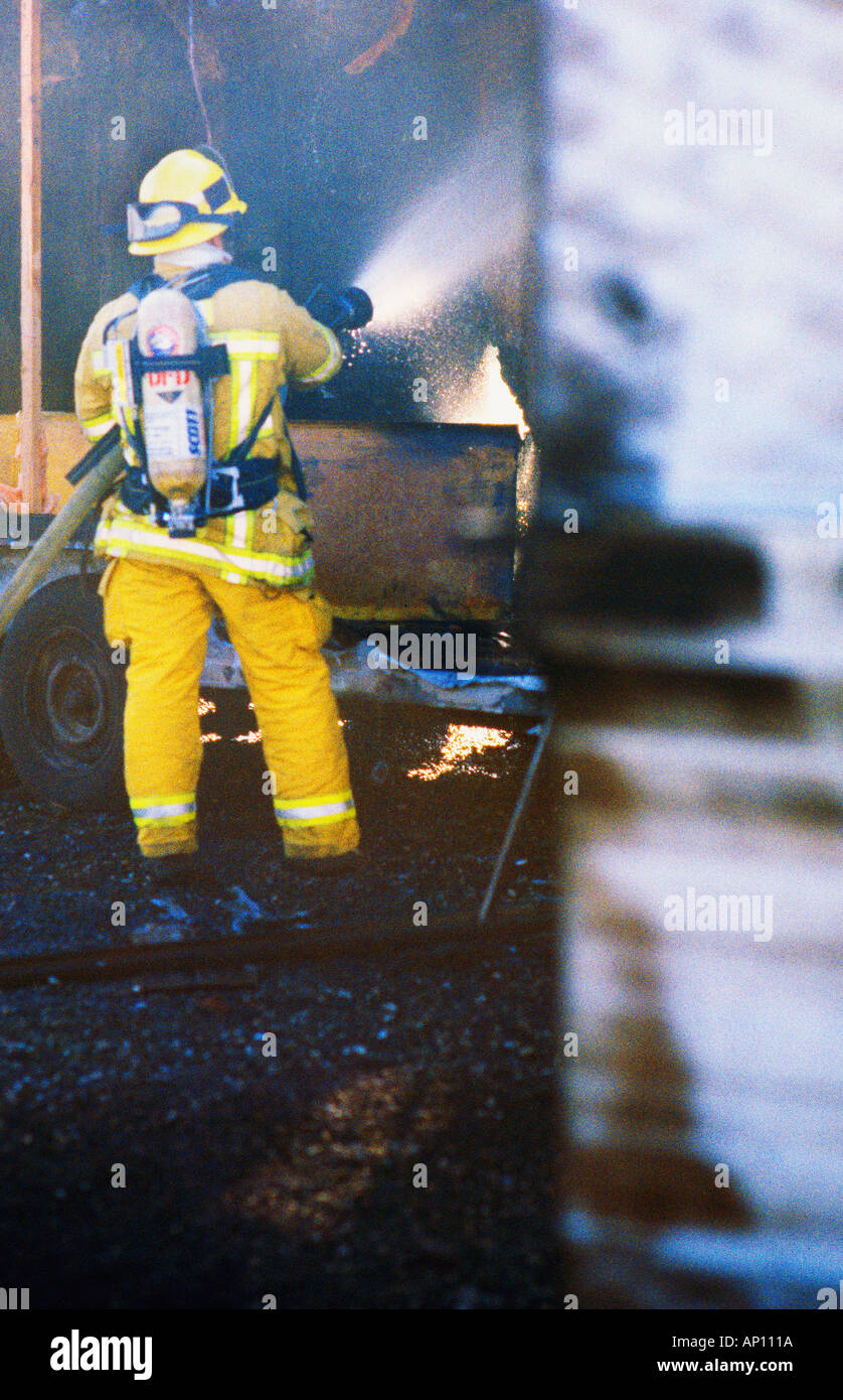 Firefighter at Fire Stock Photo - Alamy