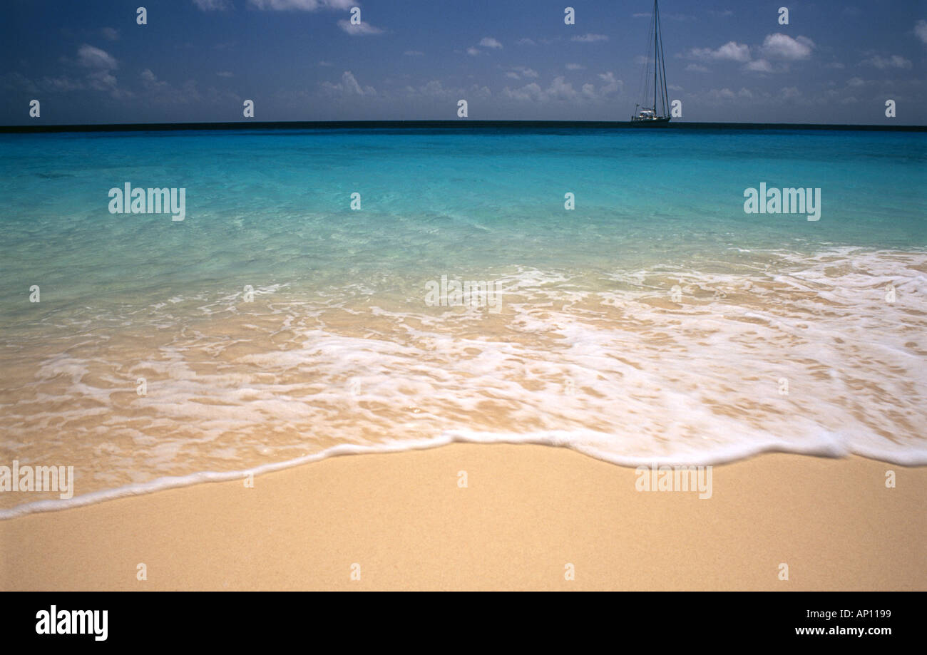 Waves lapping Caribbean beach Stock Photo - Alamy