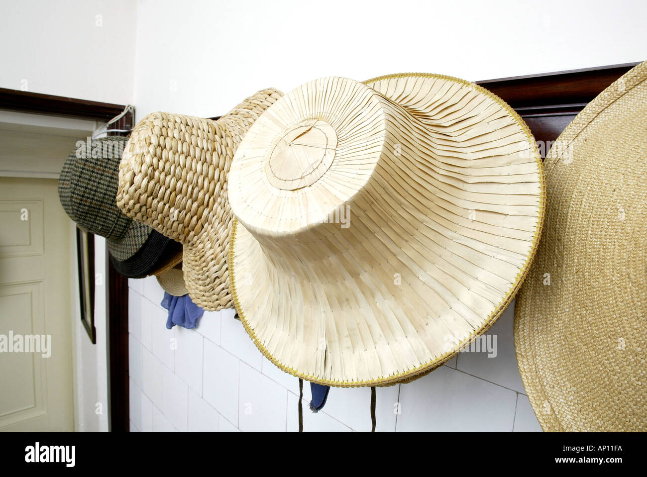 Hats hanging from a rail Stock Photo - Alamy