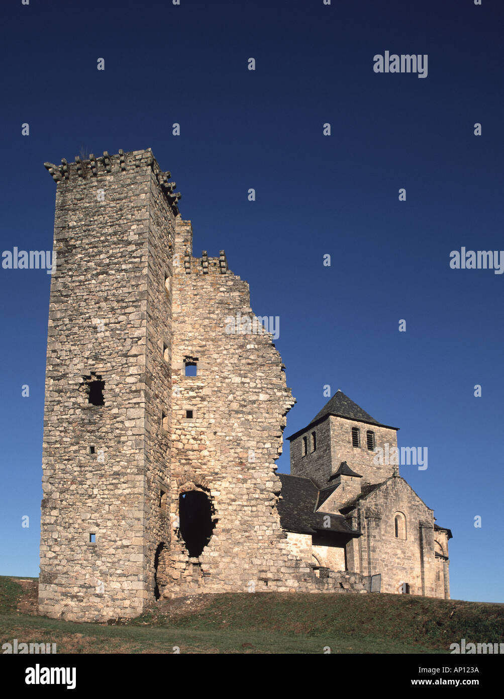 Romanesque church and ruined castle at Cornil Stock Photo - Alamy