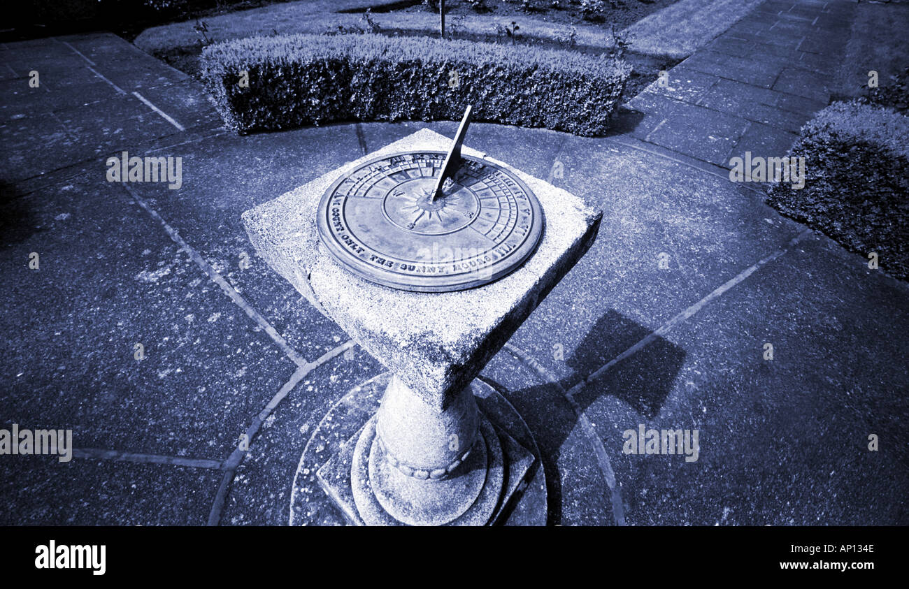 Sun clock in public garden public domain Stock Photo - Alamy