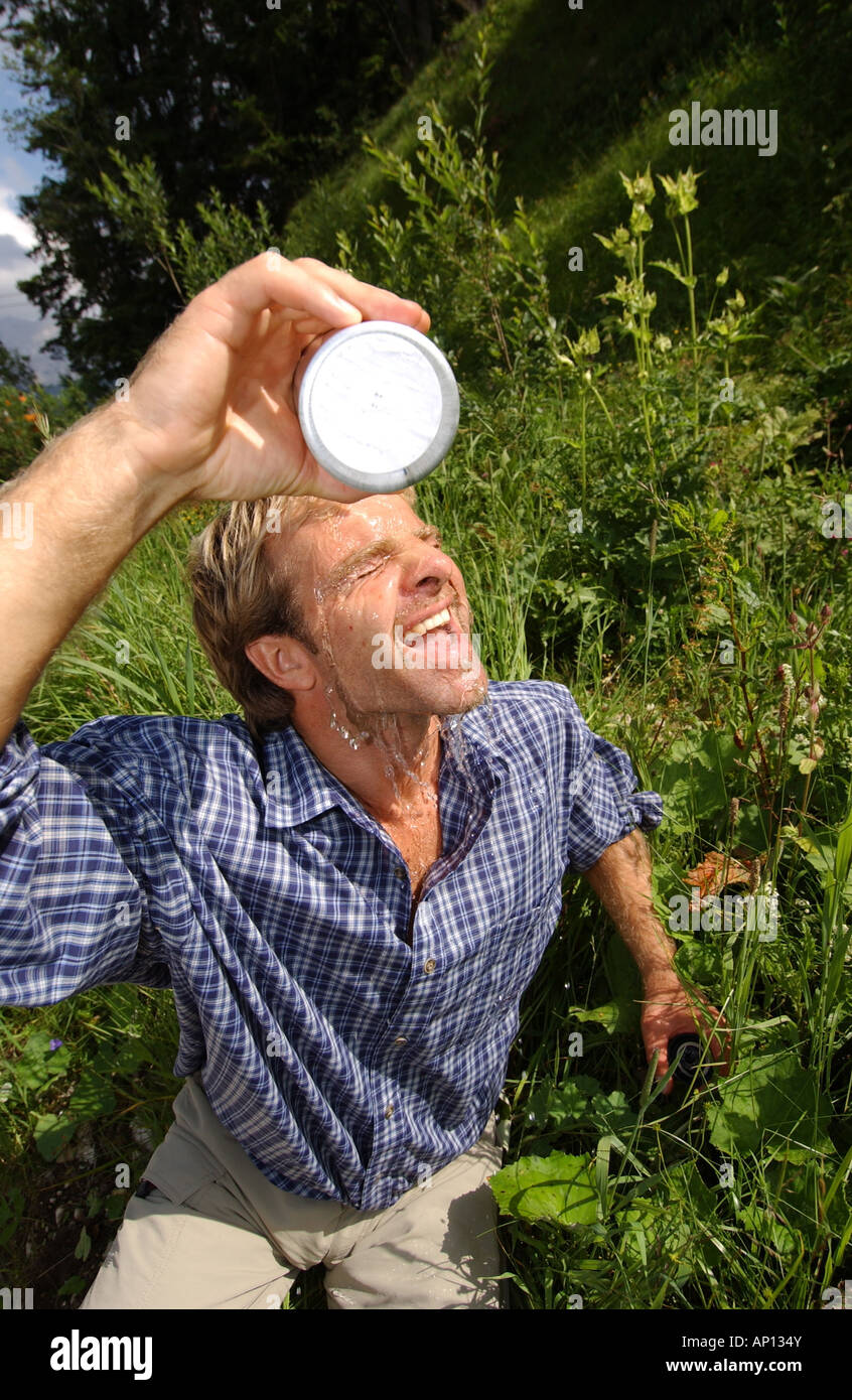 Pouring water over head hi-res stock photography and images - Alamy