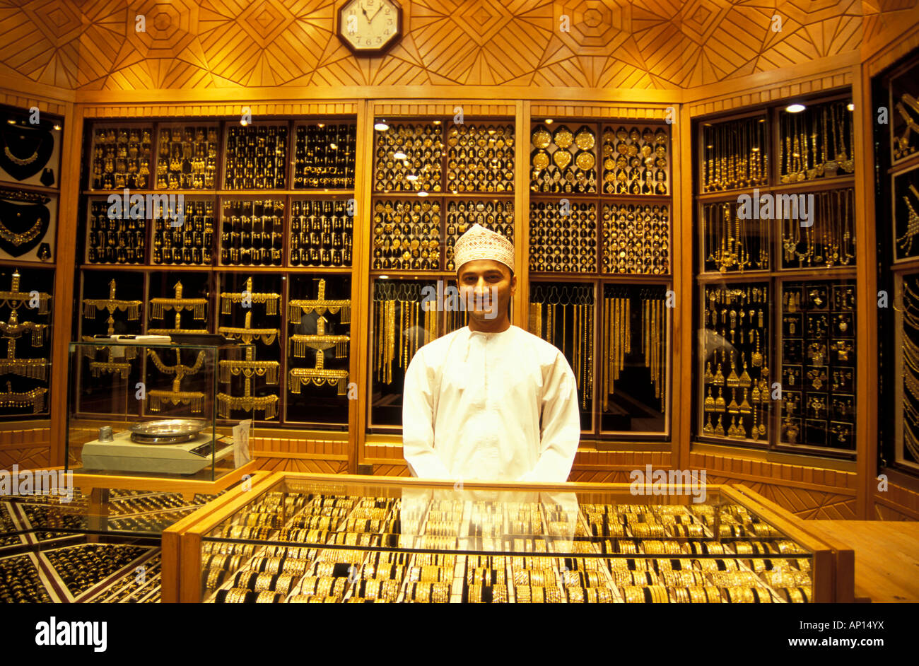 Young salesman in a shop, gold souk, Muscat, Oman Stock Photo - Alamy