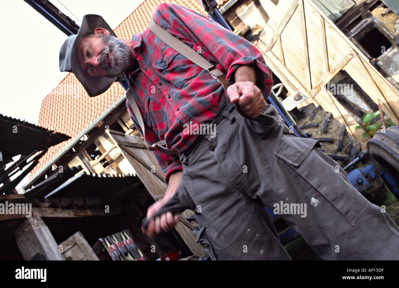 poor farmer showing his empty pockets Stock Photo - Alamy
