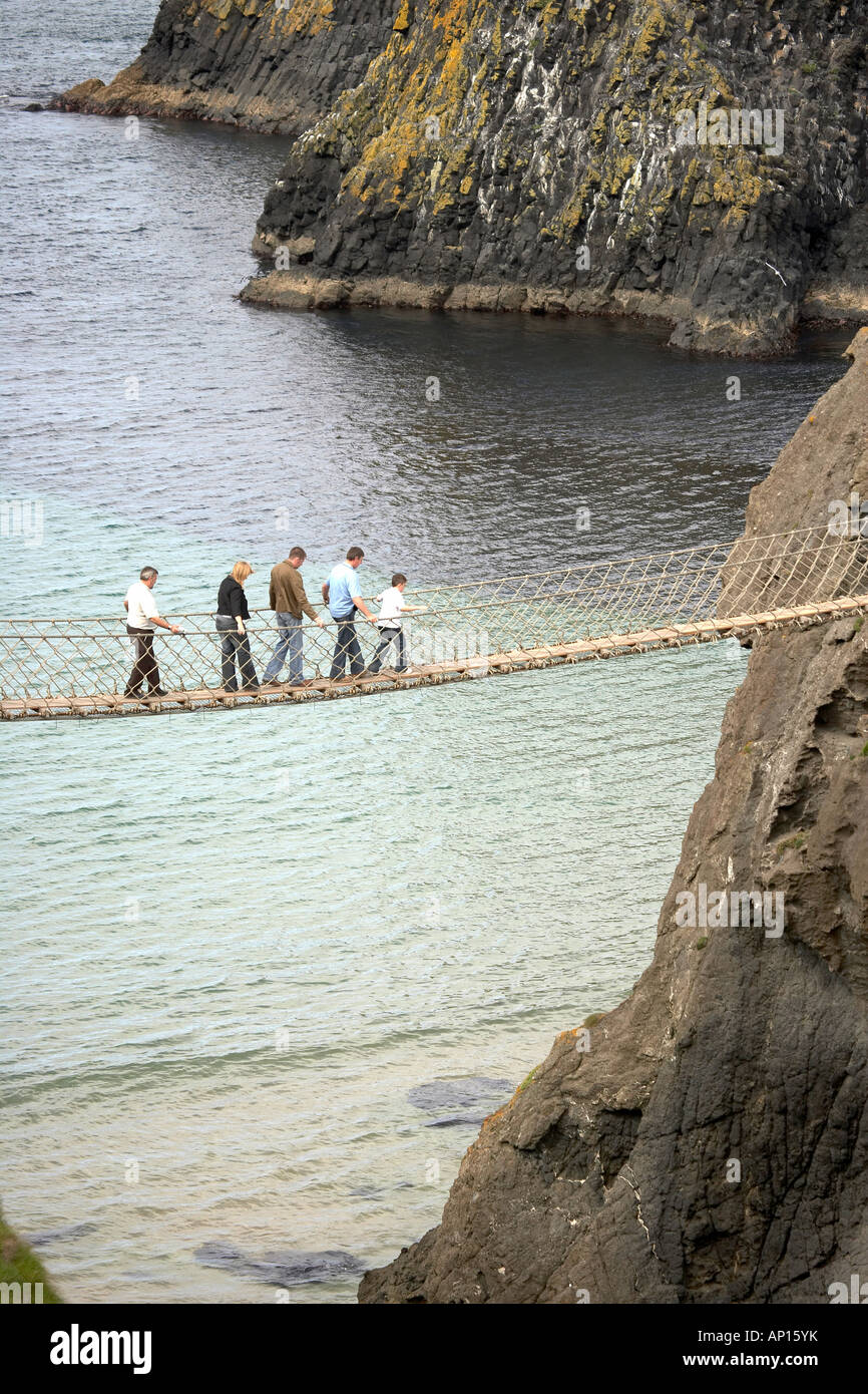 People crossing the Carrick a Rede rop bridge Co Antrim Northern ...