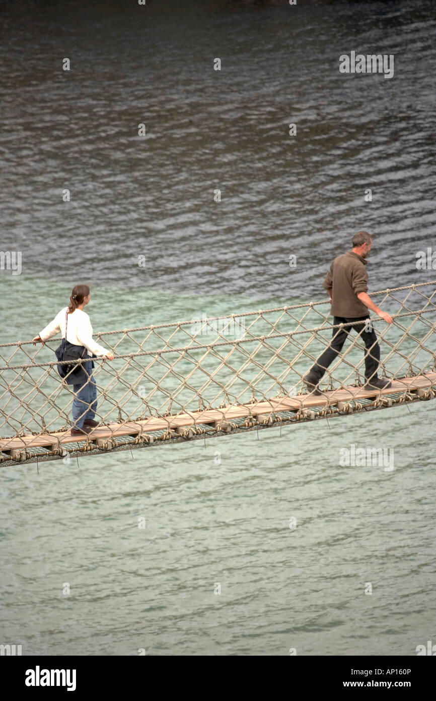 People crossing the Carrick a Rede rop bridge Co Antrim Northern ...