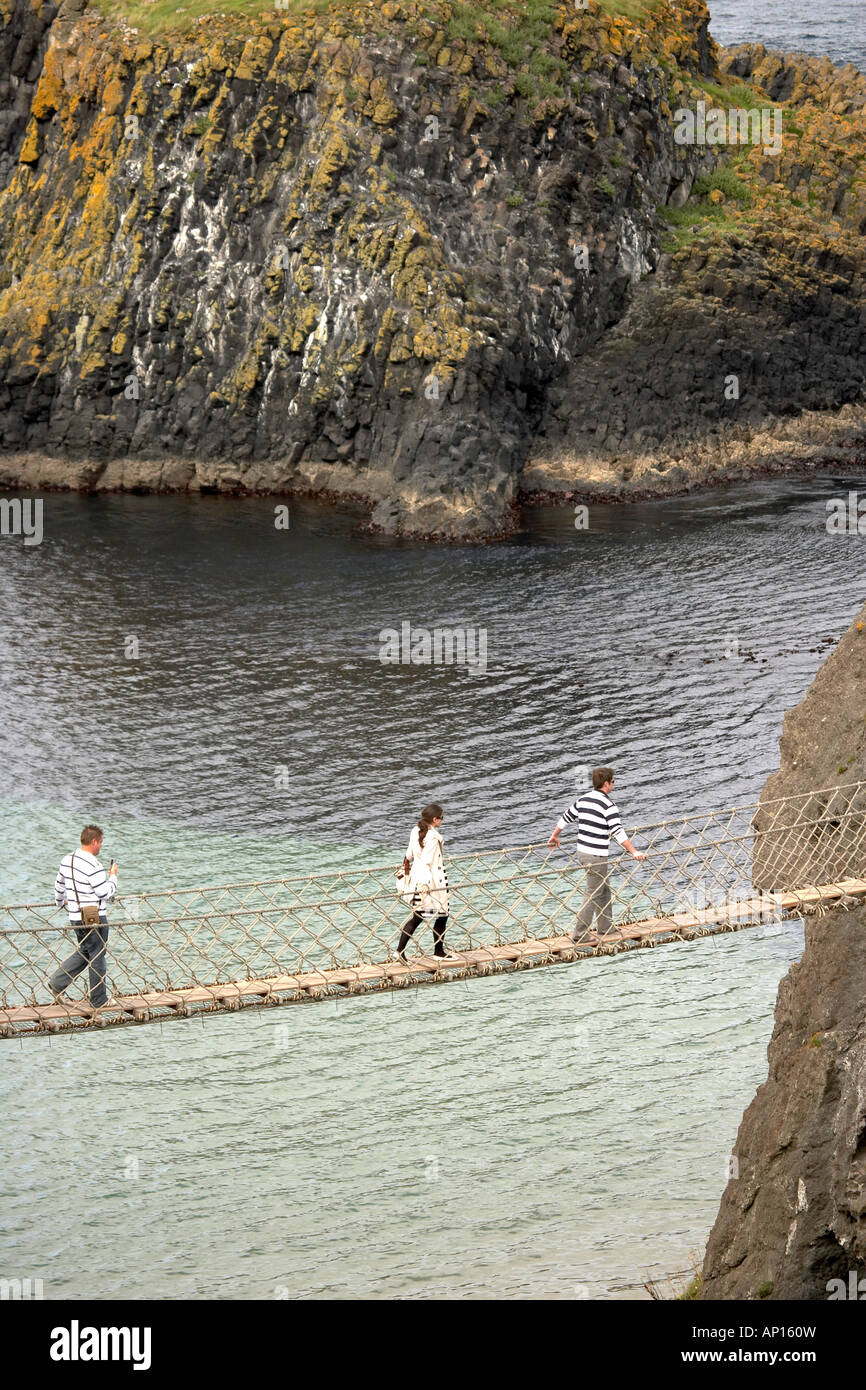 People crossing the Carrick a Rede rop bridge Co Antrim Northern ...