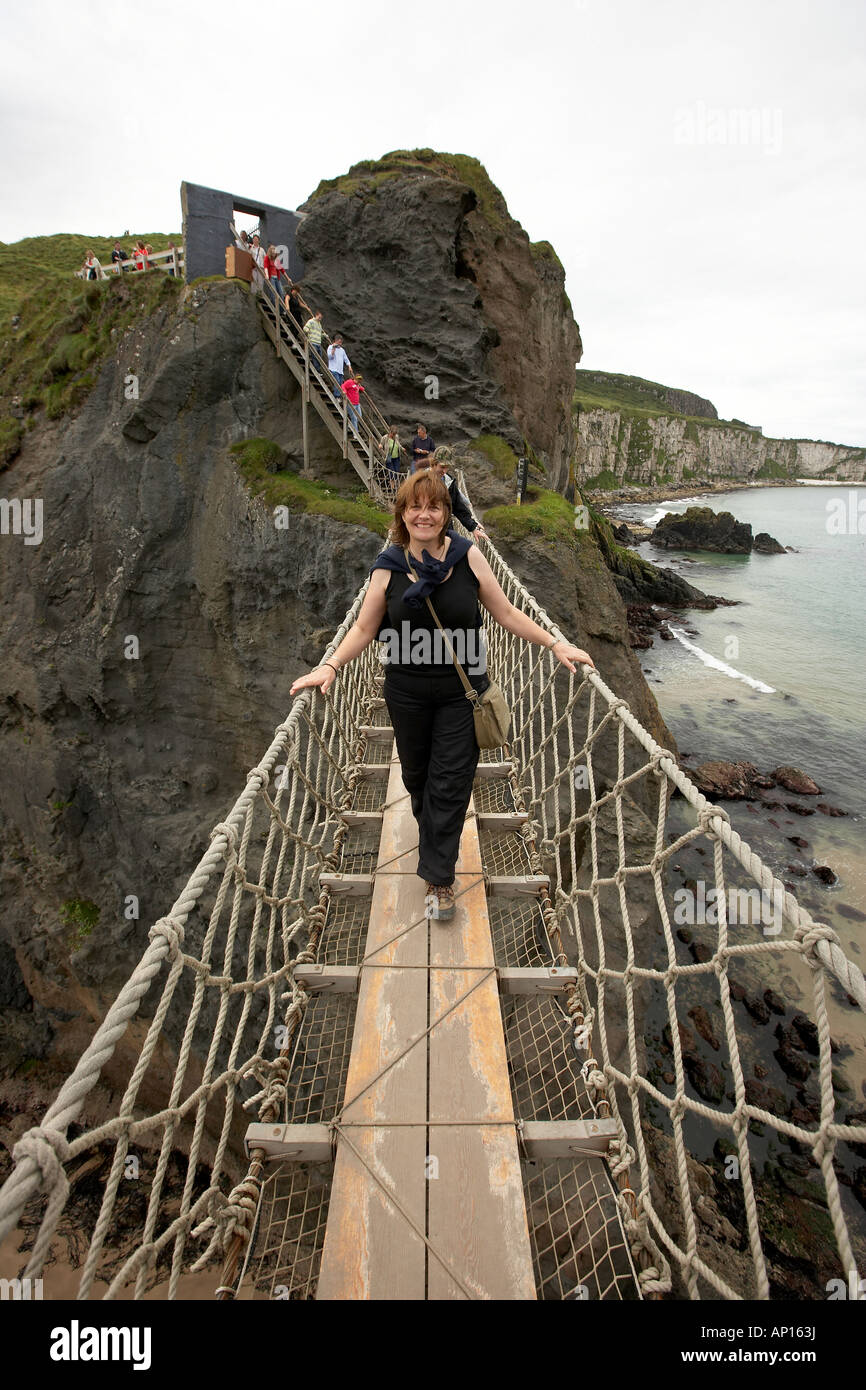 People crossing the Carrick a Rede rop bridge Co Antrim Northern ...